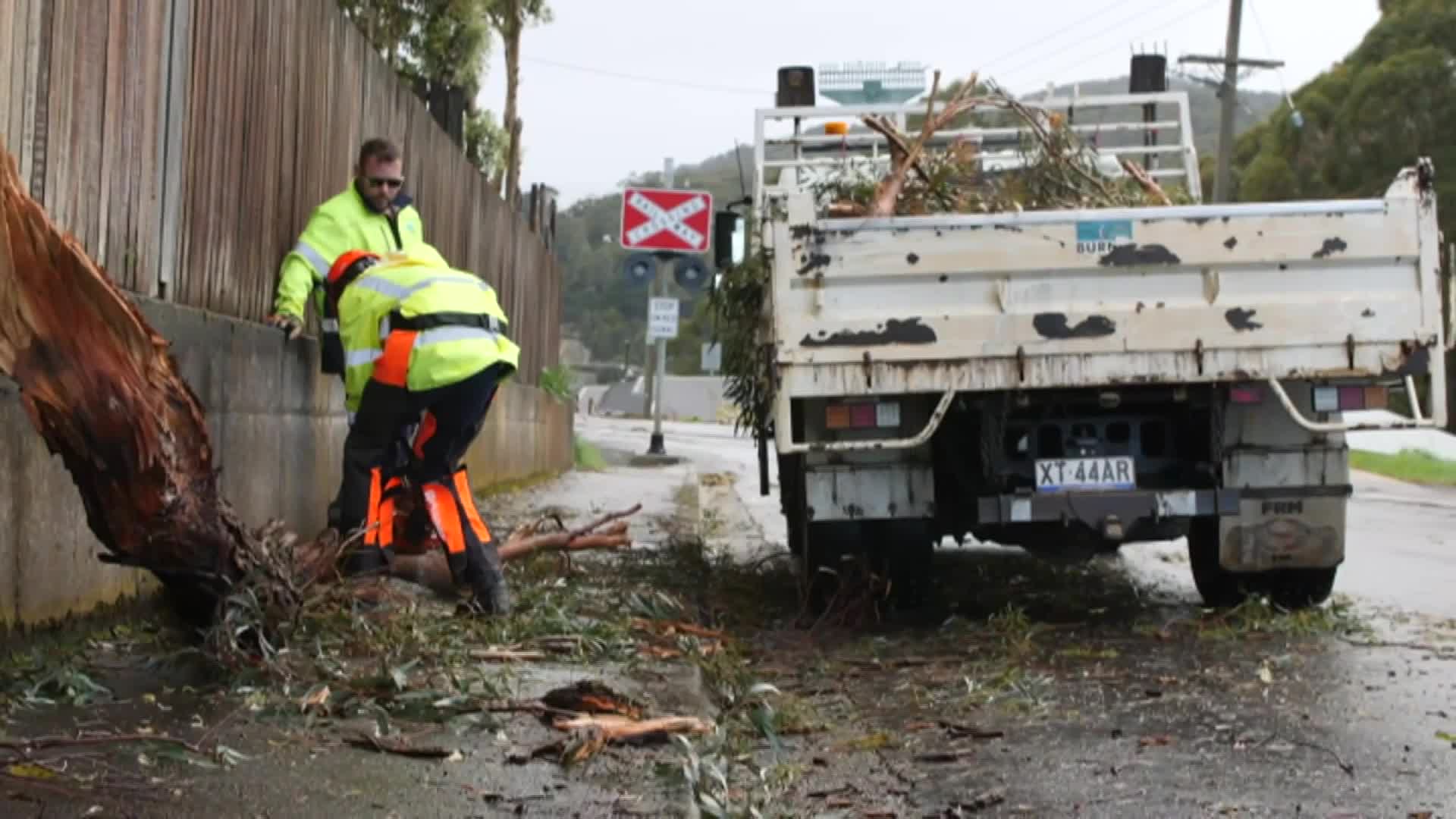 Two dead and thousands without power as strong winds hit Tasmania