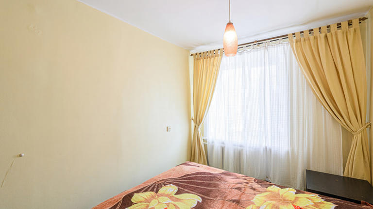 How To Style A Bedroom With An Off-Center Window