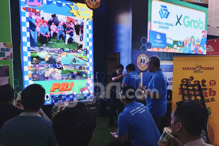 Kolaborasi MVG dan Grab Hadirkan Booth Interaktif di PRJ Surabaya 2025