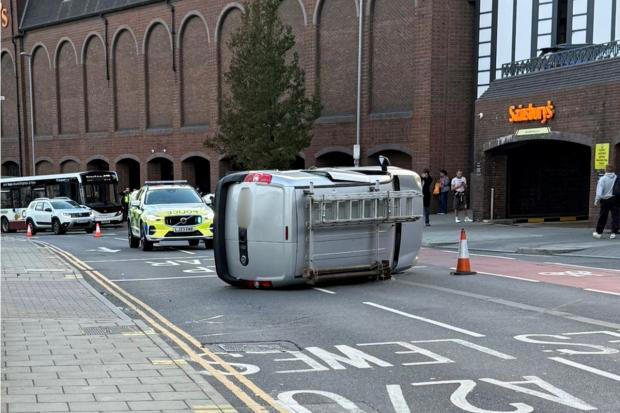 Van overturned in two-vehicle collision