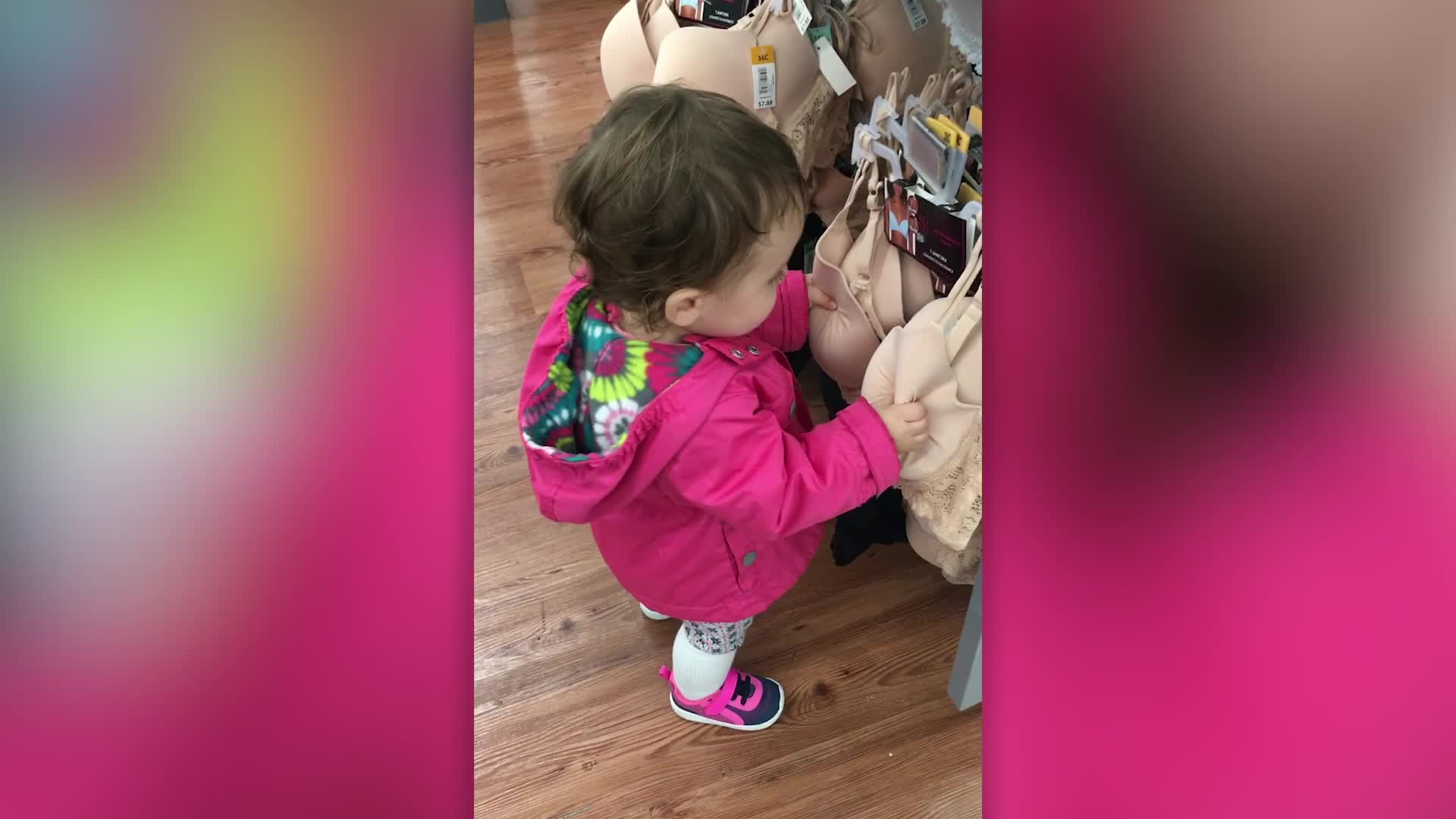 Hungry Toddler Tries To Feed On Bras In Walmart