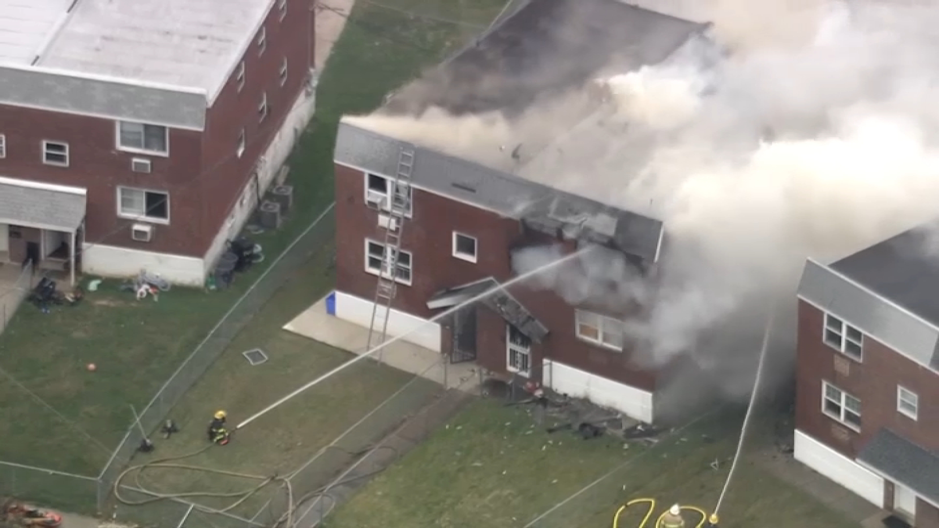 Twin home fire sends white smoke into air over Northeast Philly