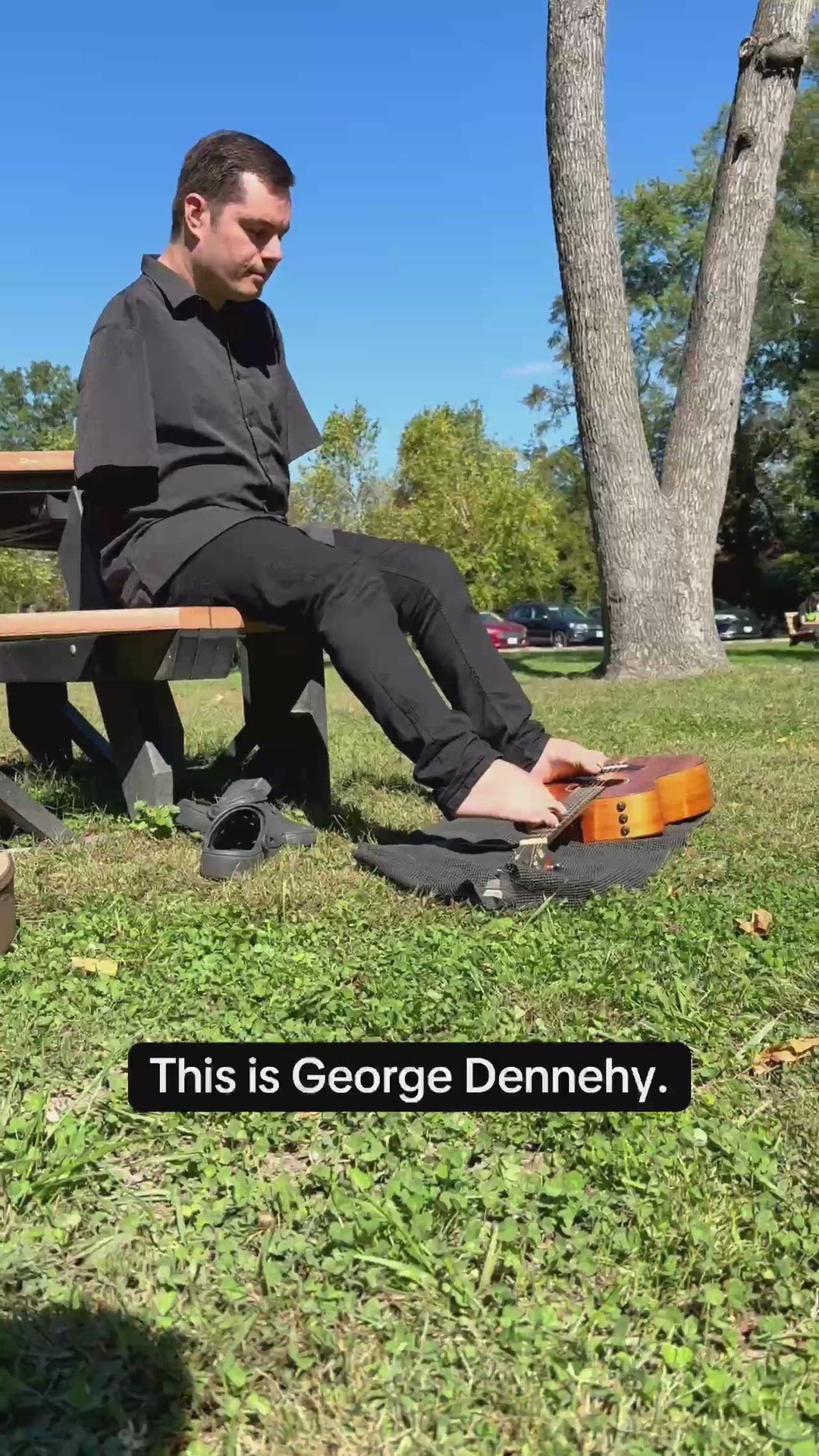 George Dennehy plays guitar without arms