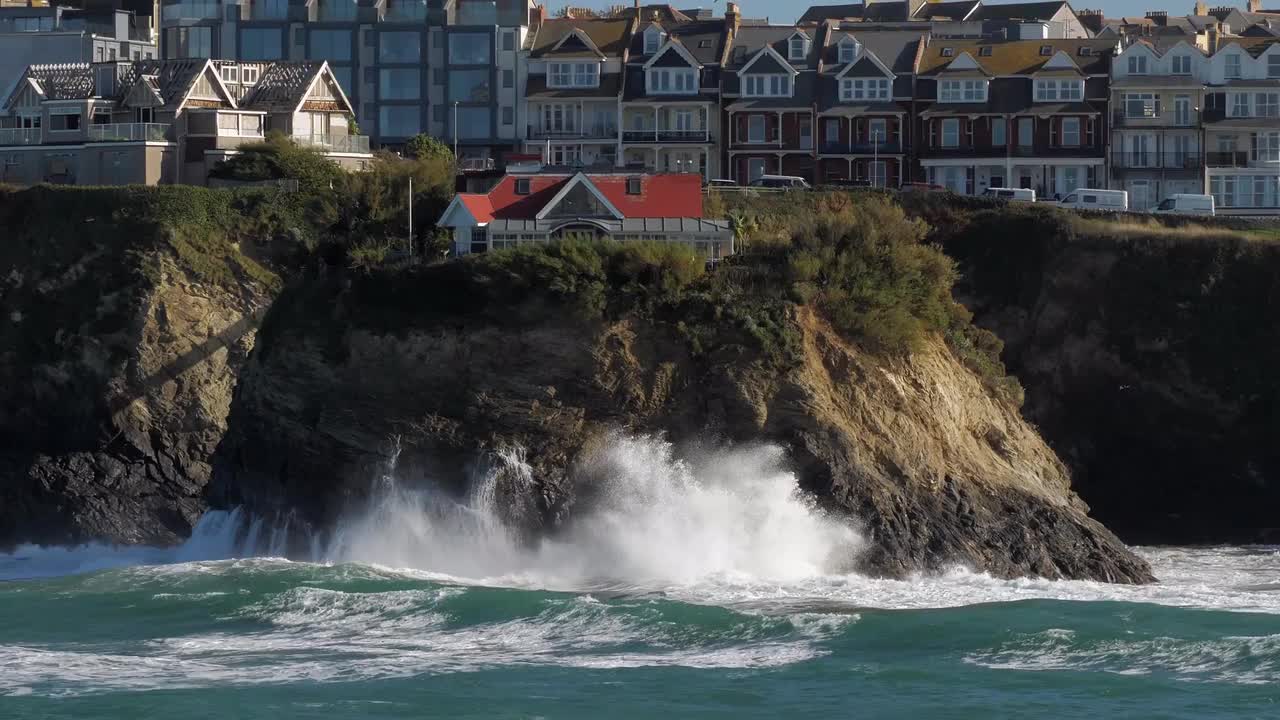 Towan Island home pounded by winter waves, Newquay, Cornwall, UK