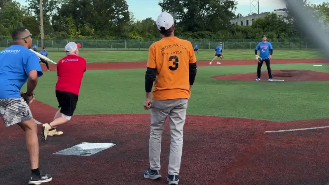 Police and fire departments compete in 'Battle of the Badges' softball game
