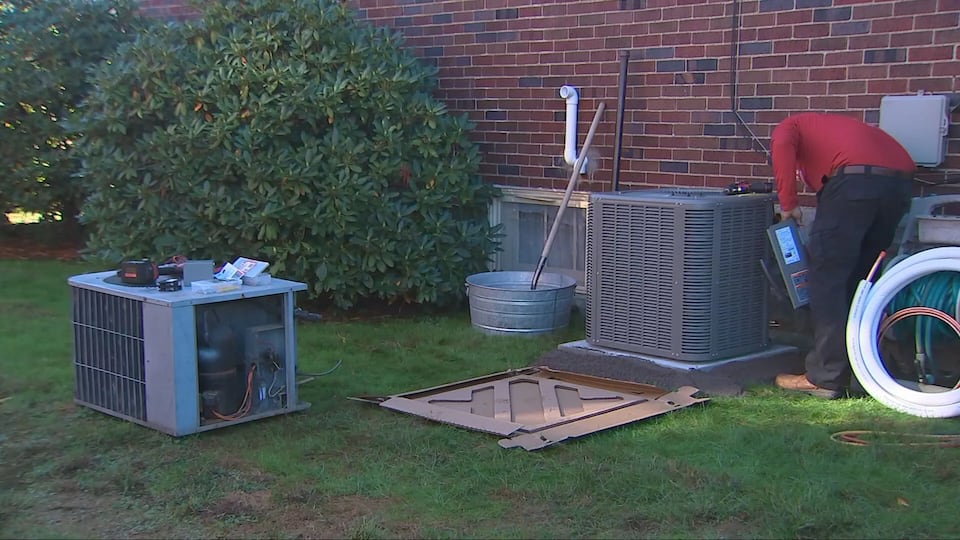 Man with cerebral palsy, his mother receive free HVAC system from ...