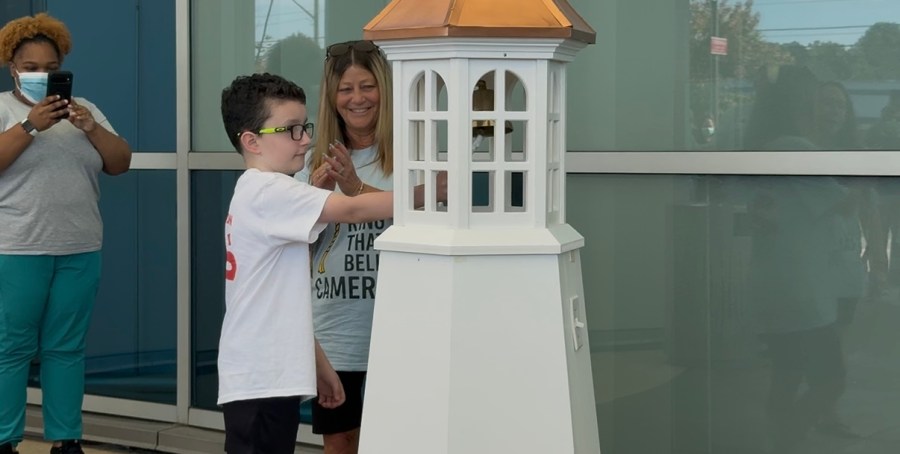 ENC family celebrates ringing the bell at Maynard Children’s Hospital
