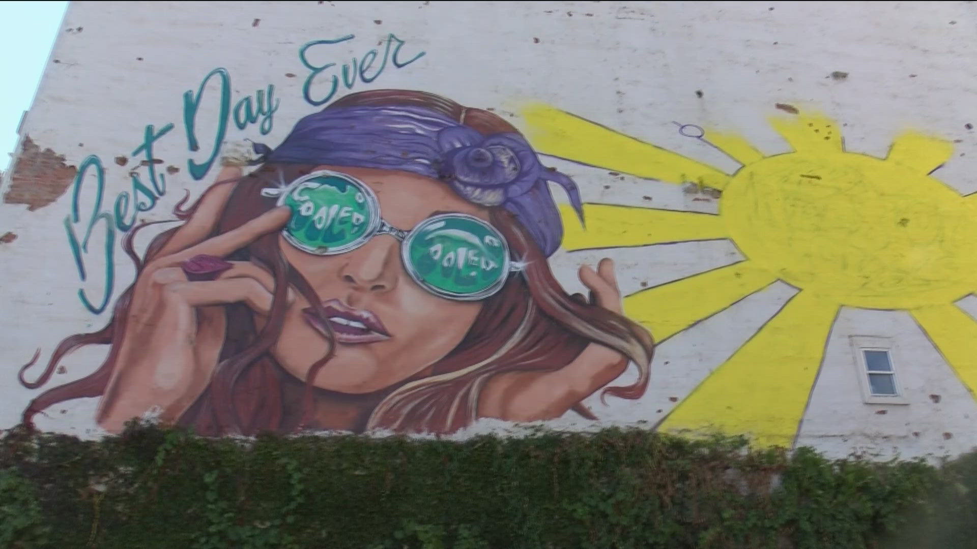 'All we need is love' | Toledo muralist spreads peace, color and good vibes