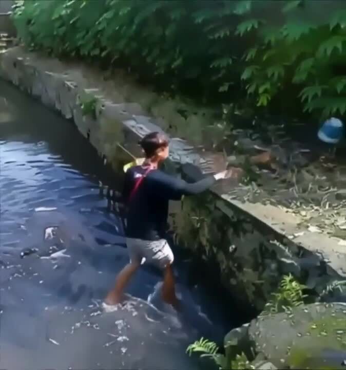 Man Falls Into River While Fishing