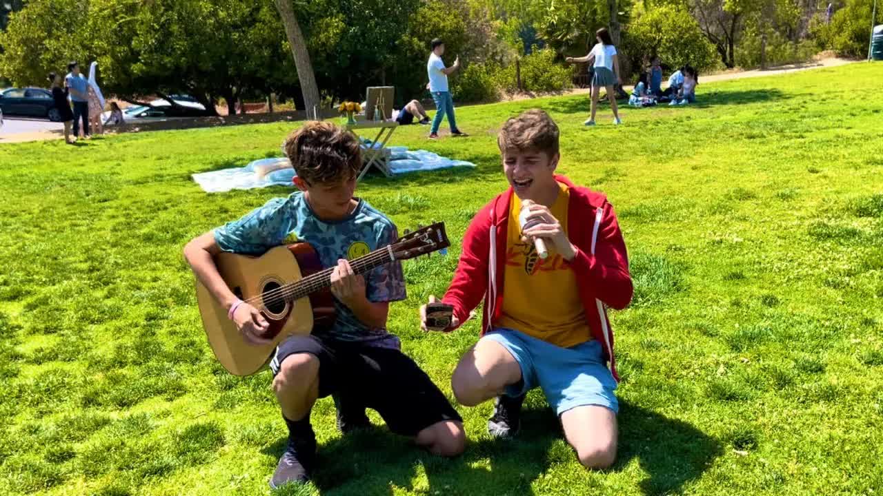 Singing "You're the best around" from Karate Kid with a fan!