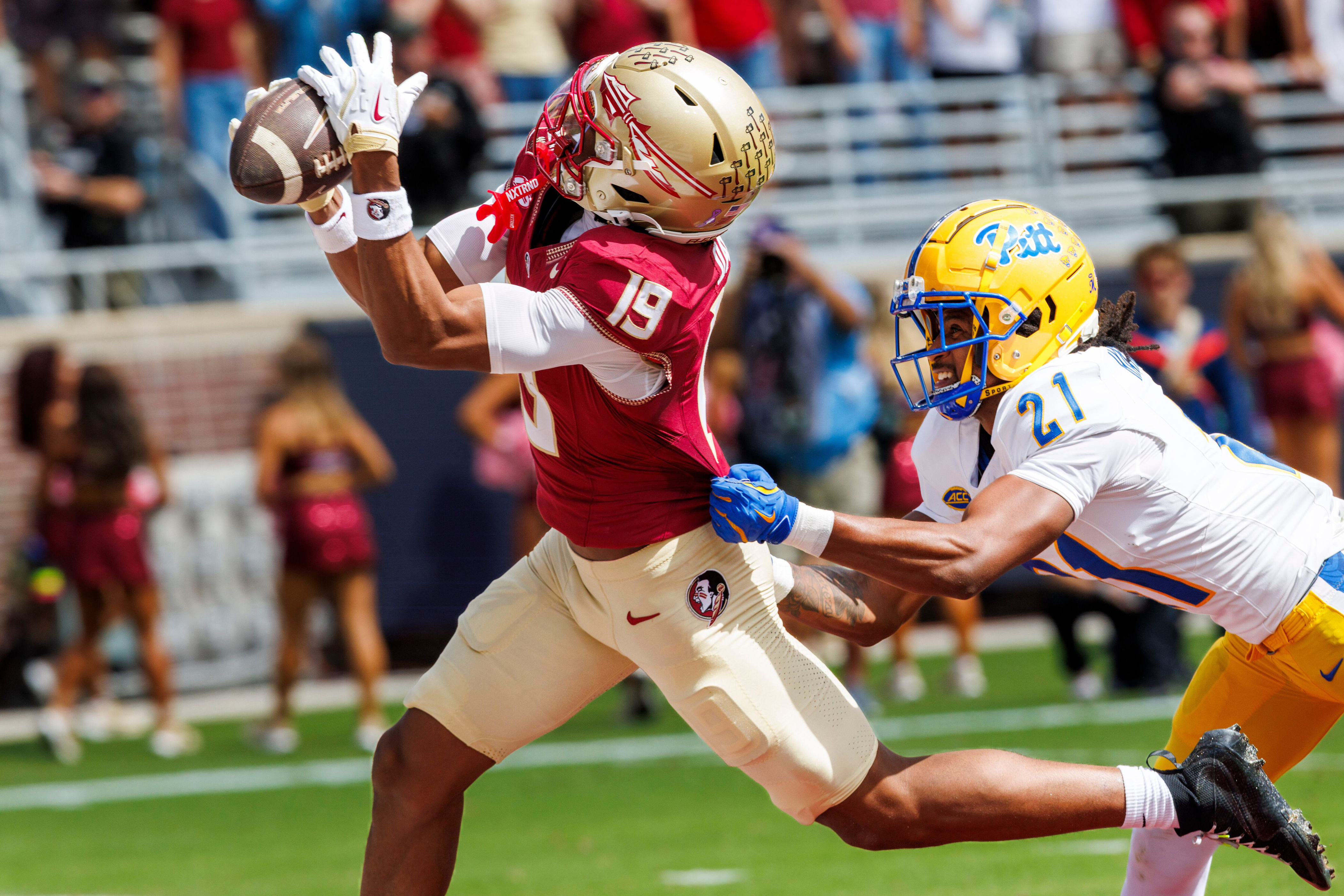 Mason Heintschel throws for 321 yards, two TDs to Desmond Reid in Pitt ...