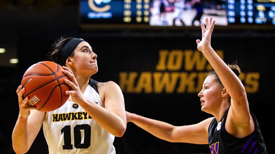 Former Iowa Center Megan Gustafson Makes History