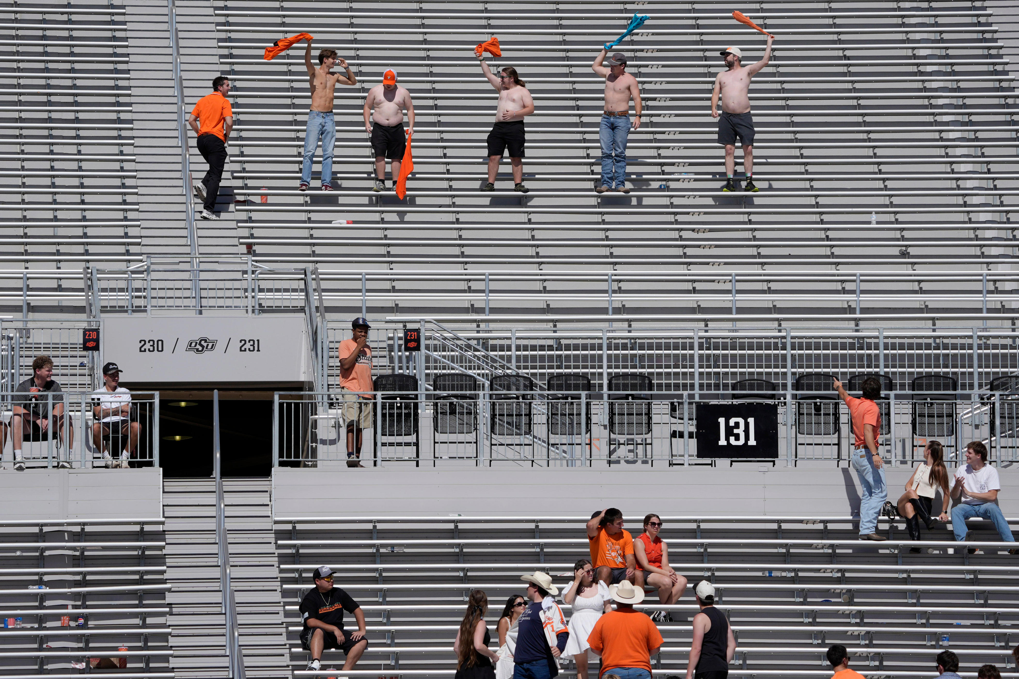 Meet the Oklahoma State football fans who started a viral shirtless ...