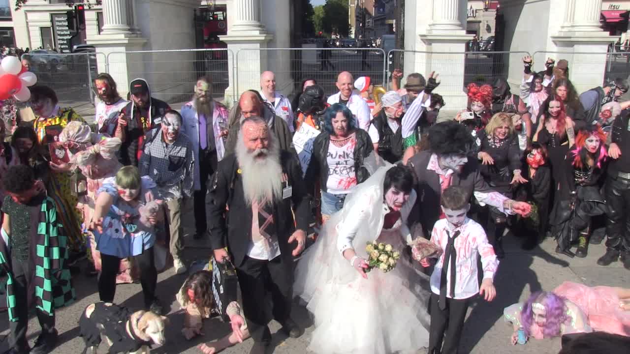 Participants dressed as gruesome zombies gather in central London for ...