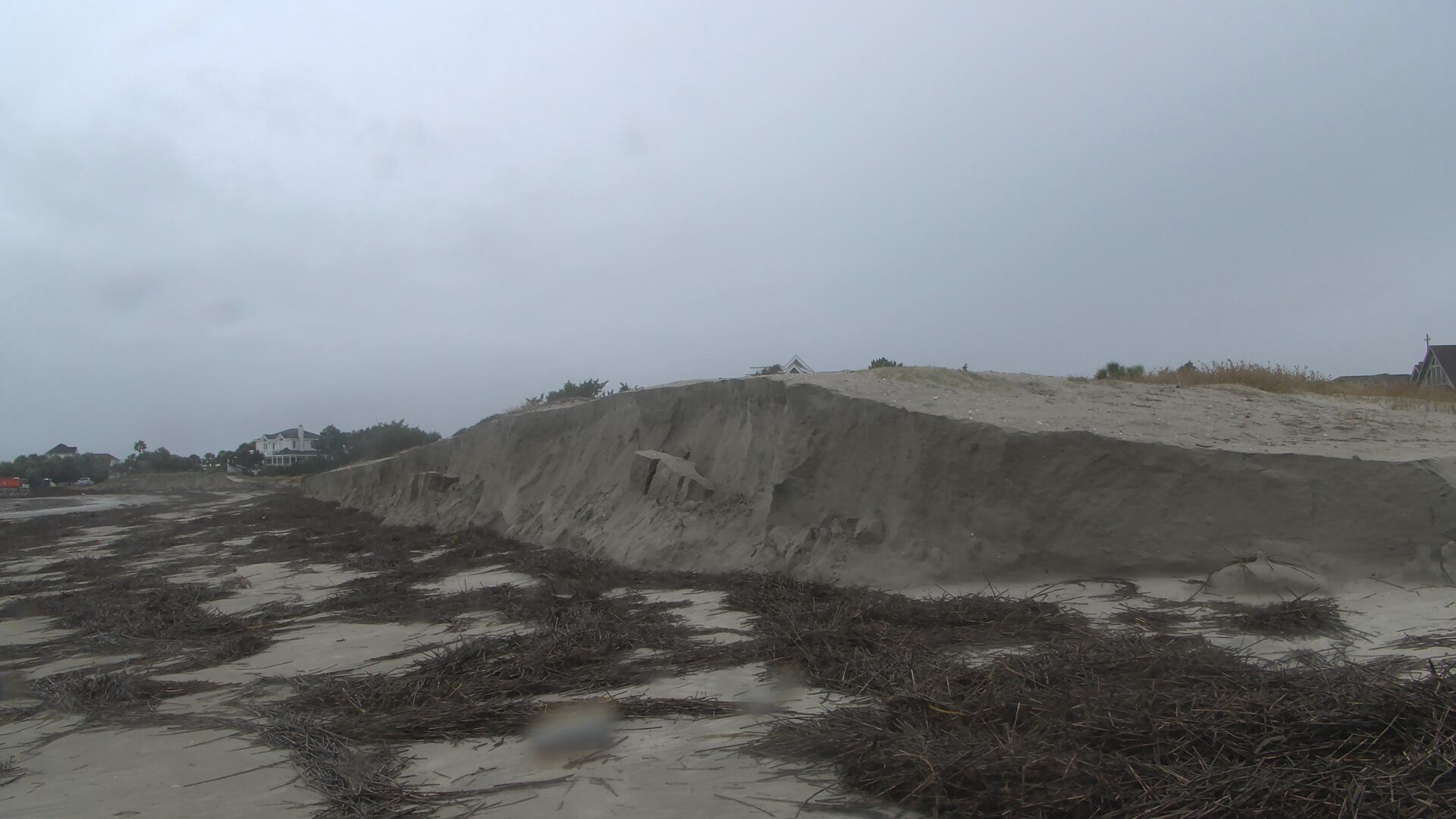 Effects of erosion leave sand piled up on Sullivan’s Island