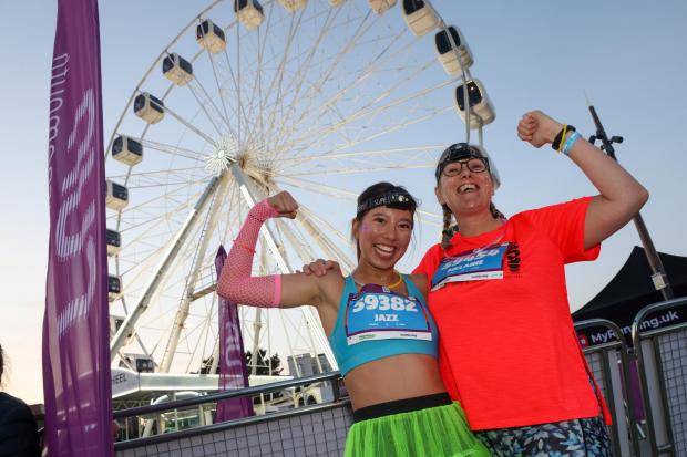 PICTURES: Huge crowds cheer as runners tackle half marathon along seafront