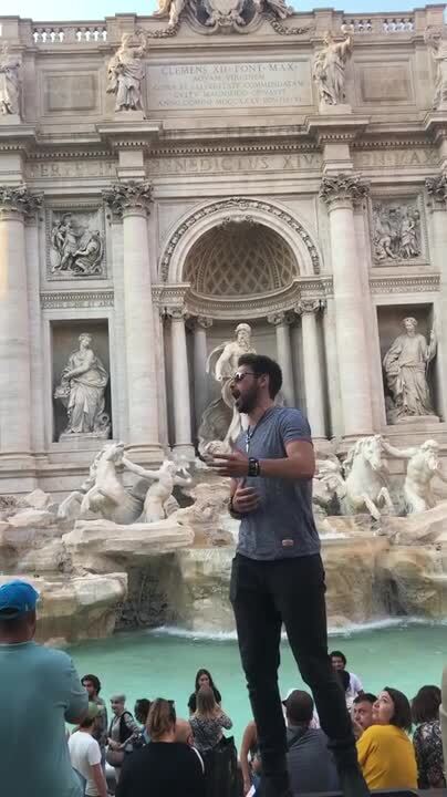 Operatic Tenor Sings at Famous Trevi Fountain