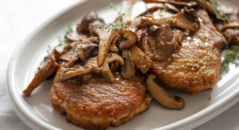 A French Classic Dinner of Pork Chops With Mushrooms Ragout