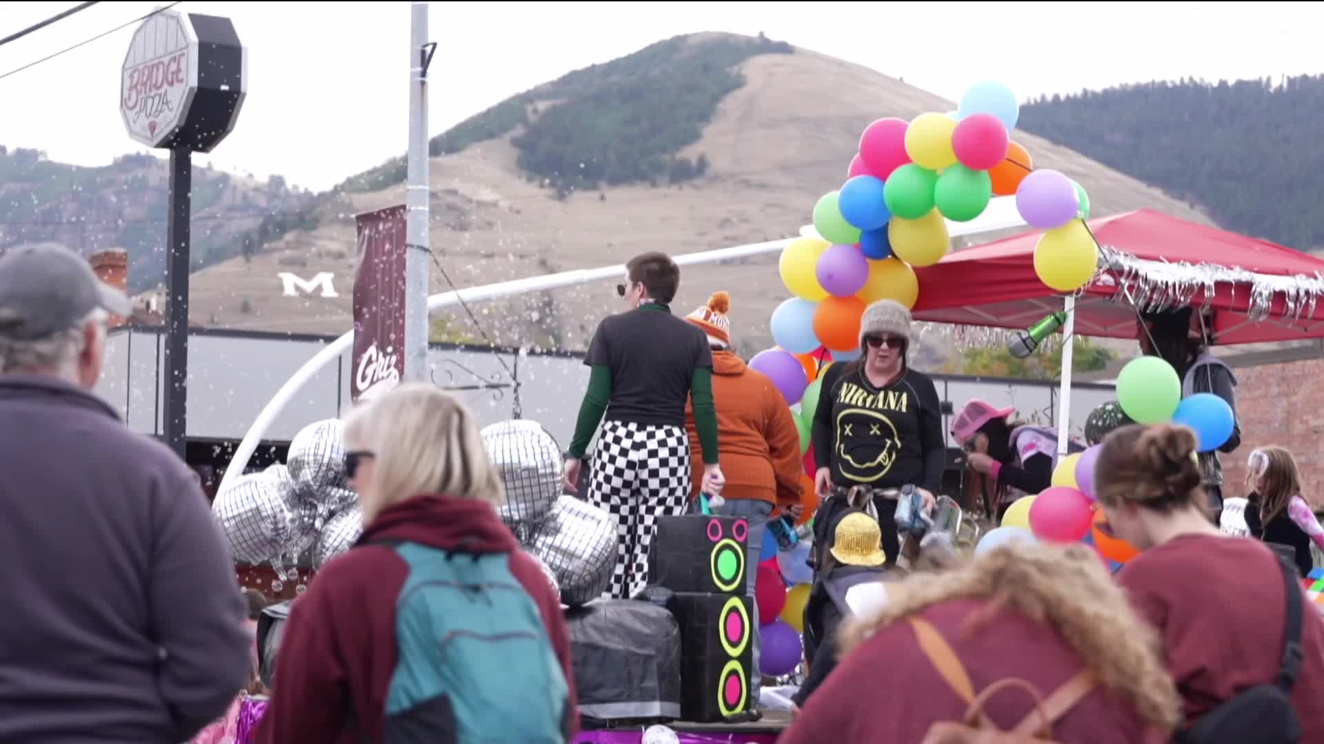 UM homecoming parade parties like it's 1995