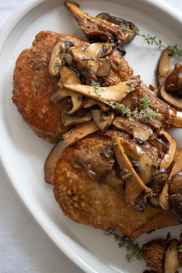 A French Classic Dinner of Pork Chops With Mushrooms Ragout