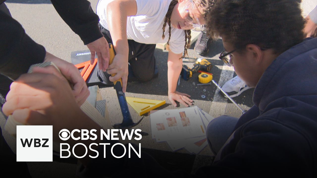 Kids from Ron Burton Training Village build benches for the community