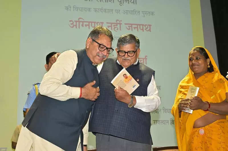 Launch of Poonia’s book occasions ‘Snakes & Ladders’ political banter