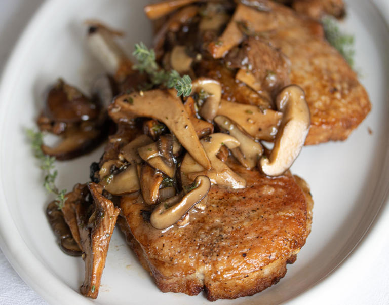 A French Classic Dinner of Pork Chops With Mushrooms Ragout