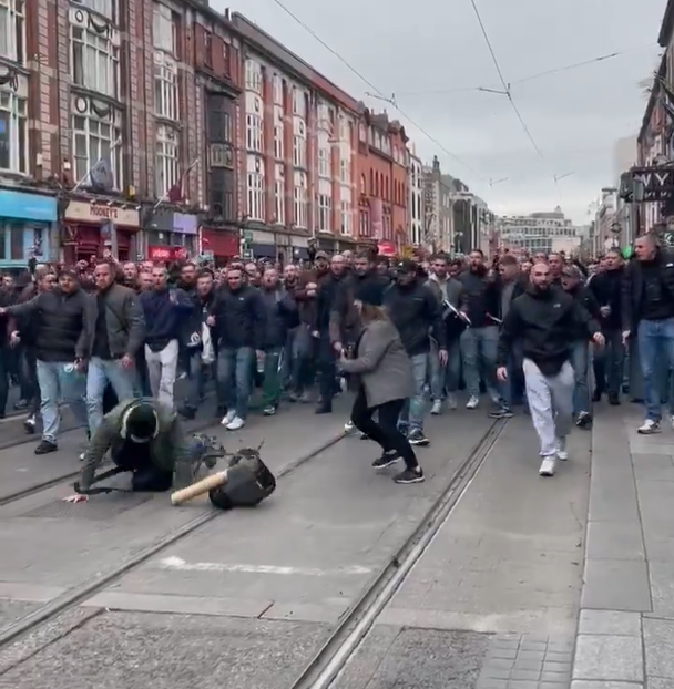 Photographer and pensioner attacked by football thugs