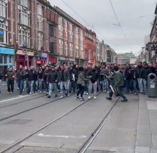 Photographer and pensioner attacked by football thugs