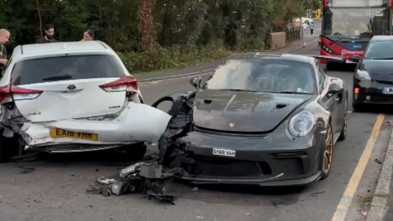 Aftermath of a serious and costly accident shows a crashed Porsche on ...
