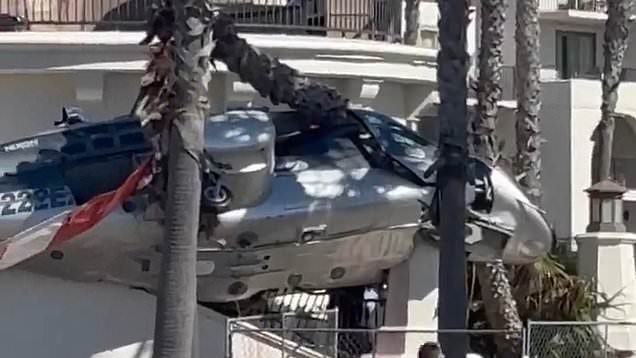 Helicopter spirals out of control and crashes on California beach