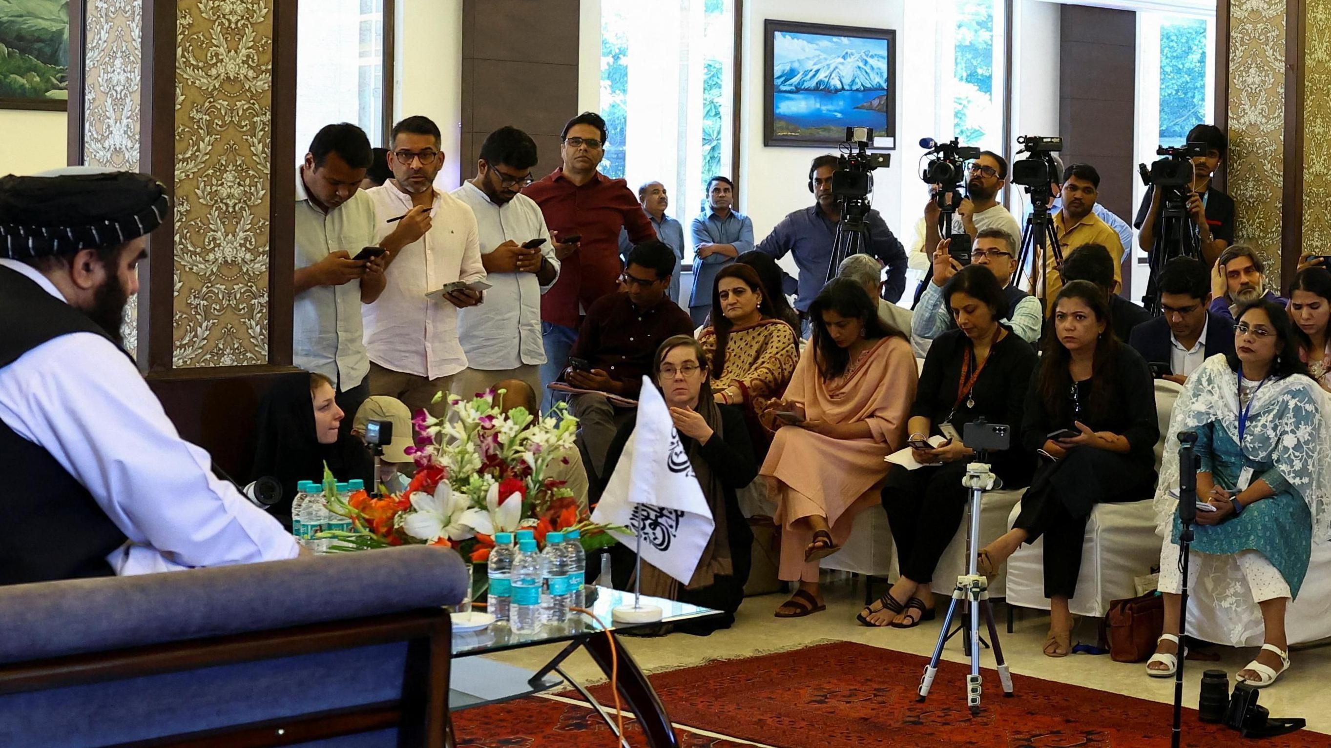 A photo worth a thousand words: Taliban minister with Indian female ...