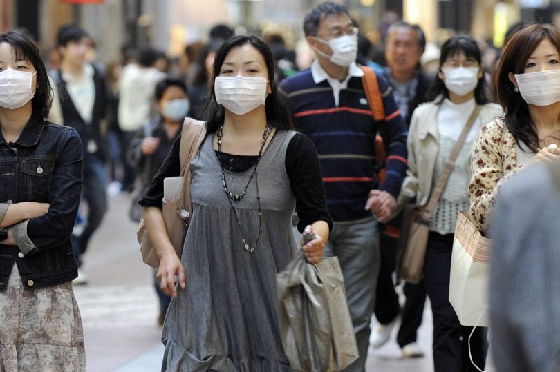 Japan flu epidemic triggers alert as fears of global spread heighten ...