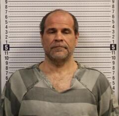 Father accused of holding gun to child’s head, threatening wife