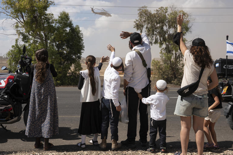 Jubilation in Israel as hostages returned to families who fought for deal