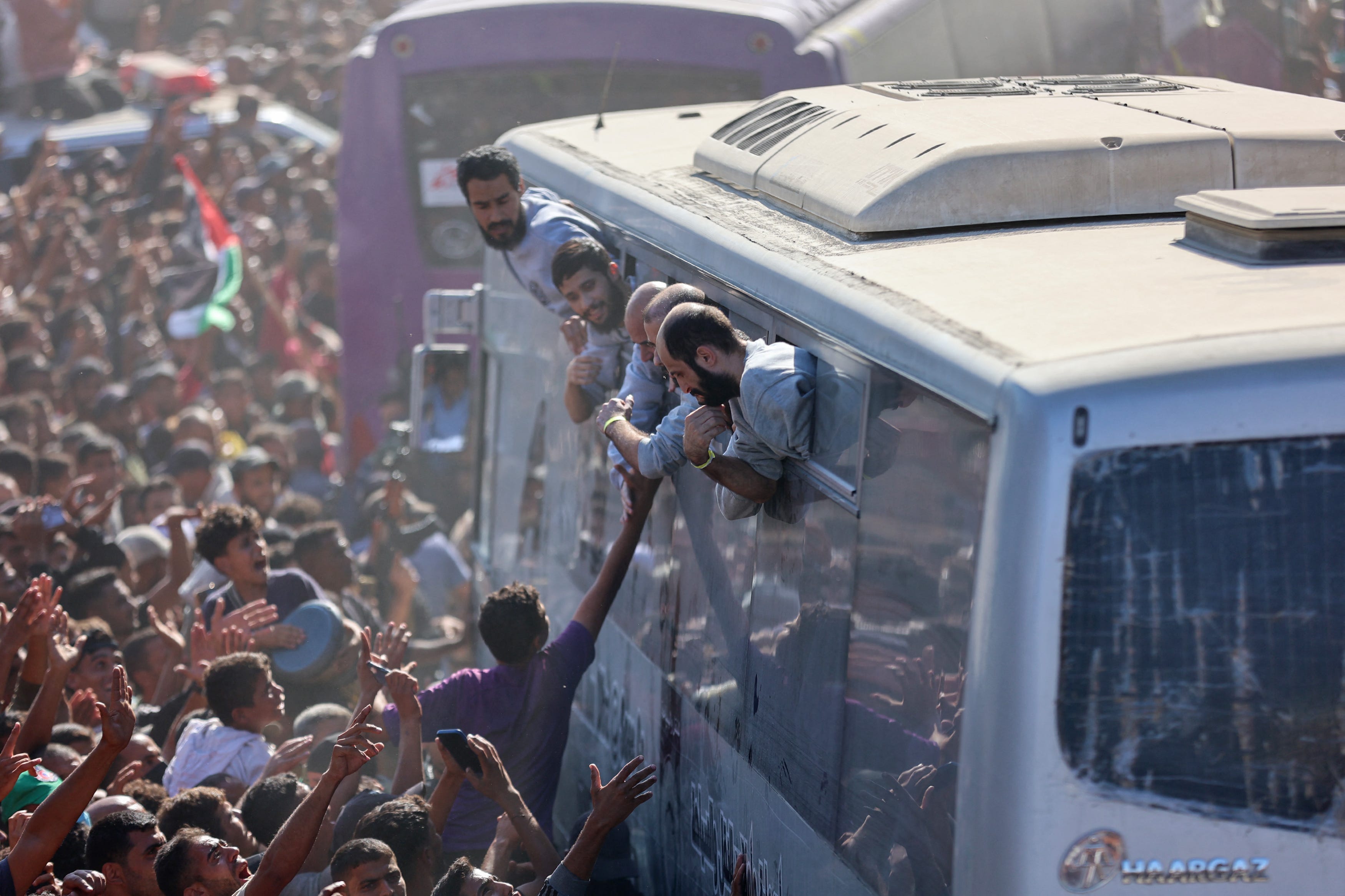 Israel begins release of nearly 2,000 Palestinian prisoners, detainees