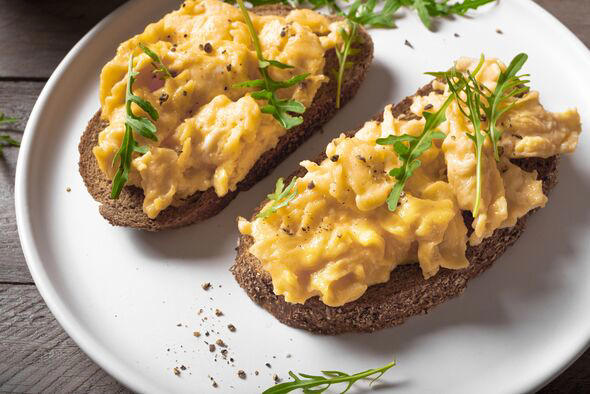Add one protein-rich ingredient to scrambled eggs to make them fluffier