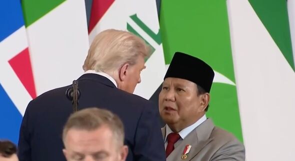 Donald Trump caught in bizarre hot mic moment after signing peace deal