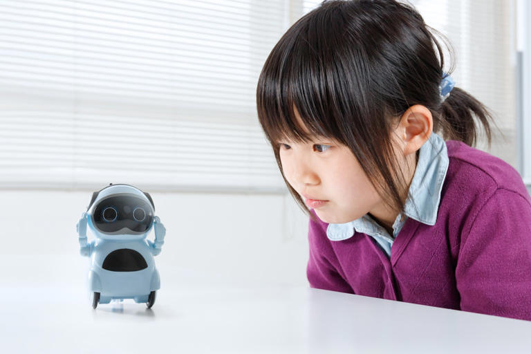 Tearful Chinese girl bids farewell to broken AI robot after it teaches ...