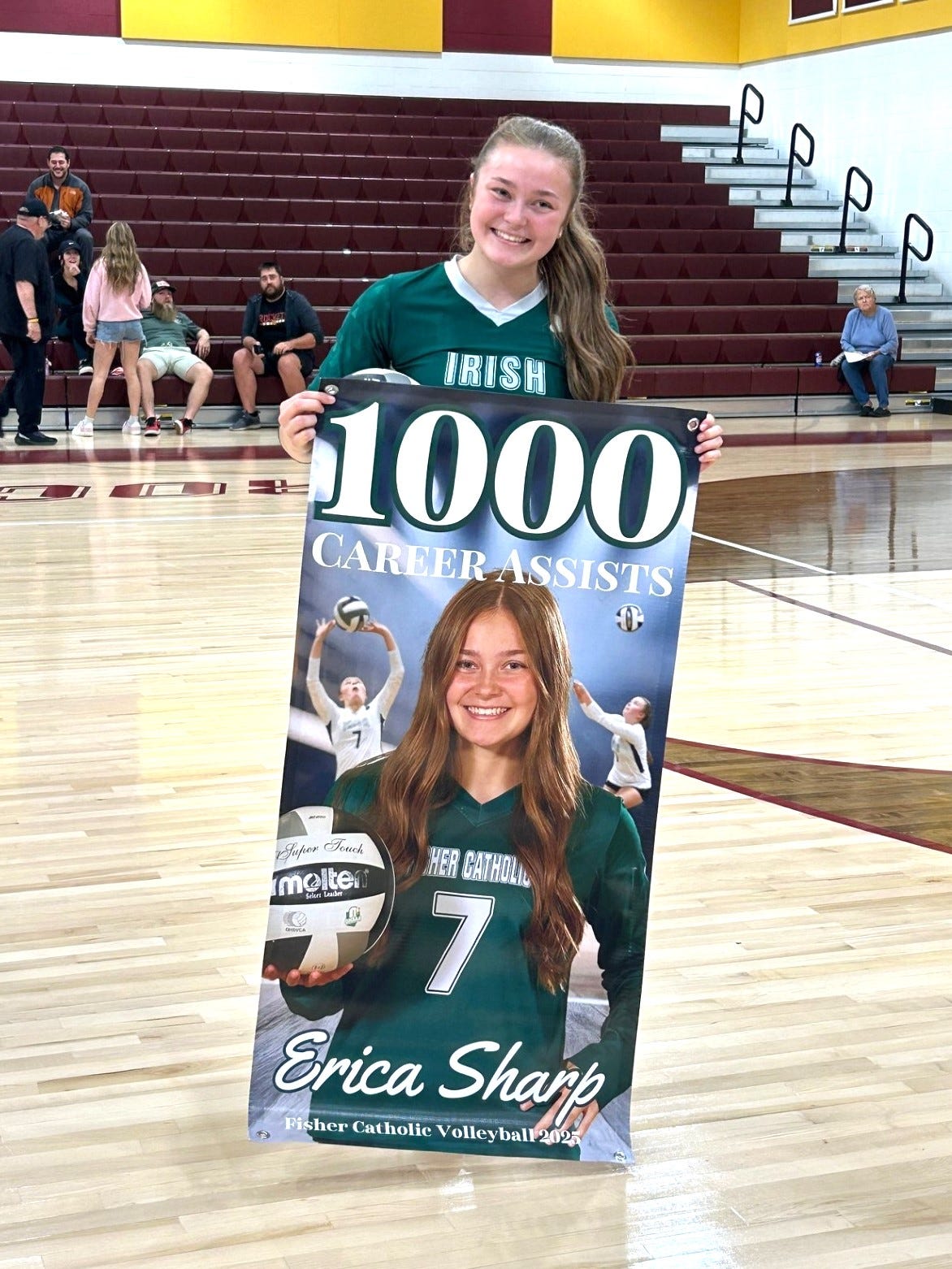 Fisher Catholic volleyball's Erica Sharp reaches milestone with her 1 ...