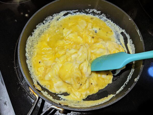 Add one protein-rich ingredient to scrambled eggs to make them fluffier