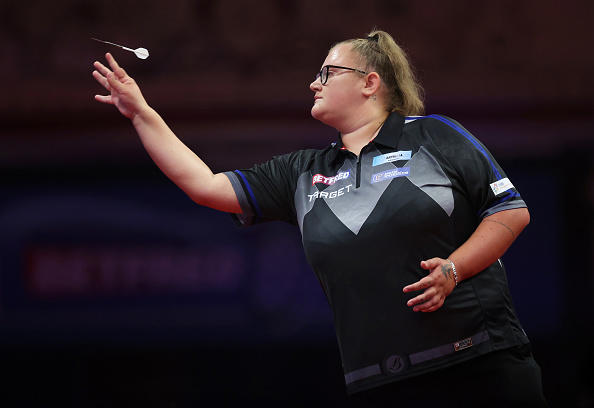 Luke Littler reacts to losing to female darts player