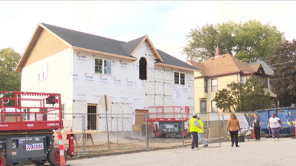 It’s steel-beam signing day at Project Renewal’s new building