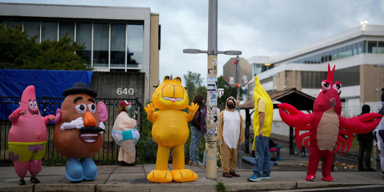 ‘The Most Portland Thing’: Protesters In Inflatable Animal Outfits ...
