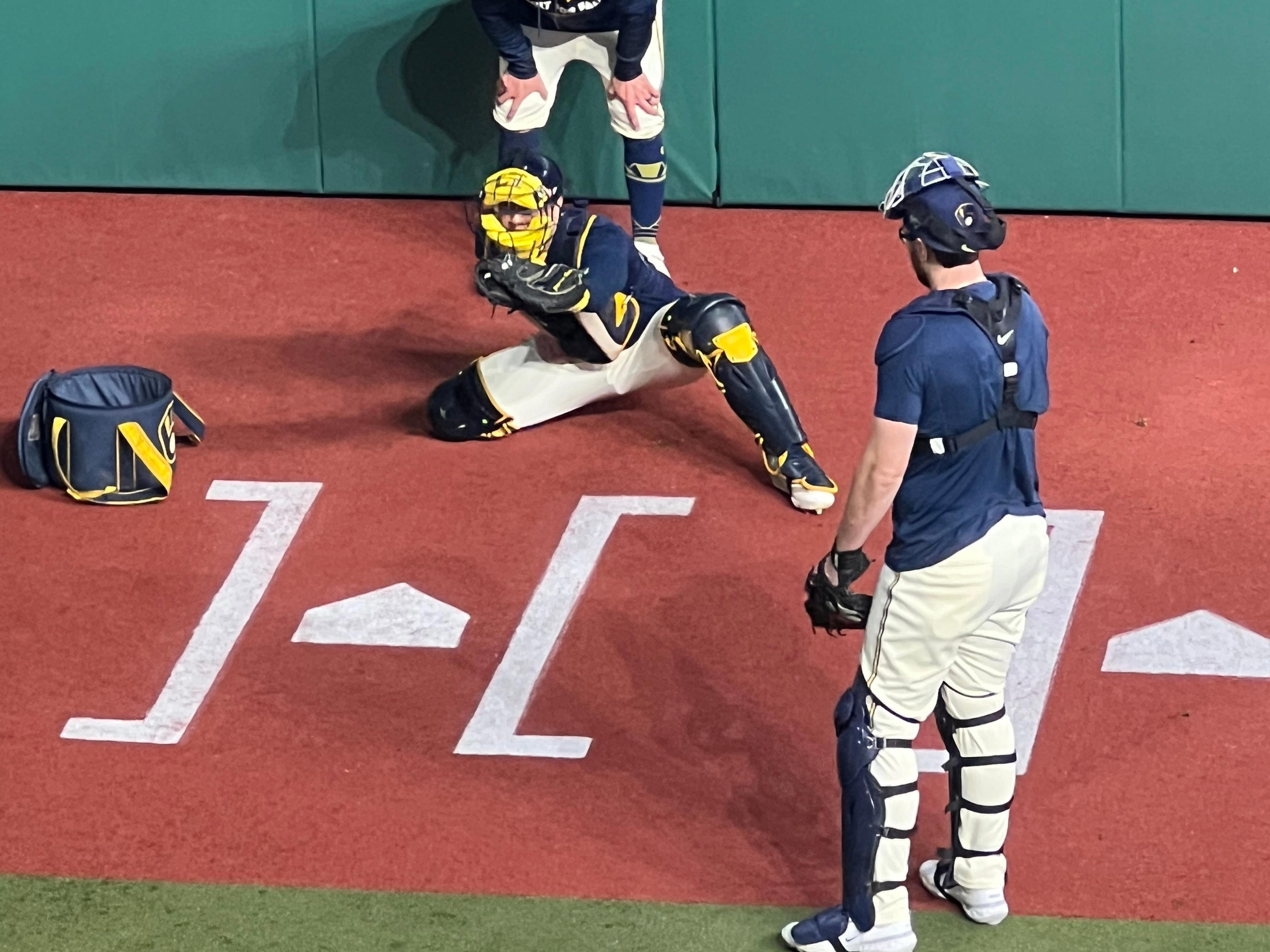 Brewers bullpen catchers are 'like a caddie' for relief pitchers during ...