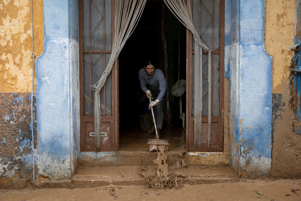 Spain flooding map: Weather alerts remain in place after homes ...