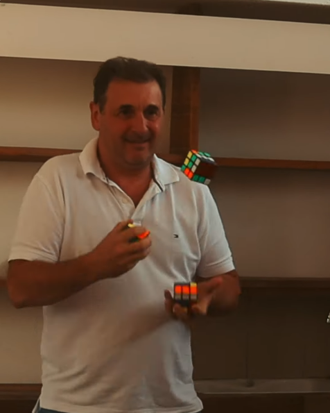 He Solves 3 Rubiks Cubes While Juggling!!
