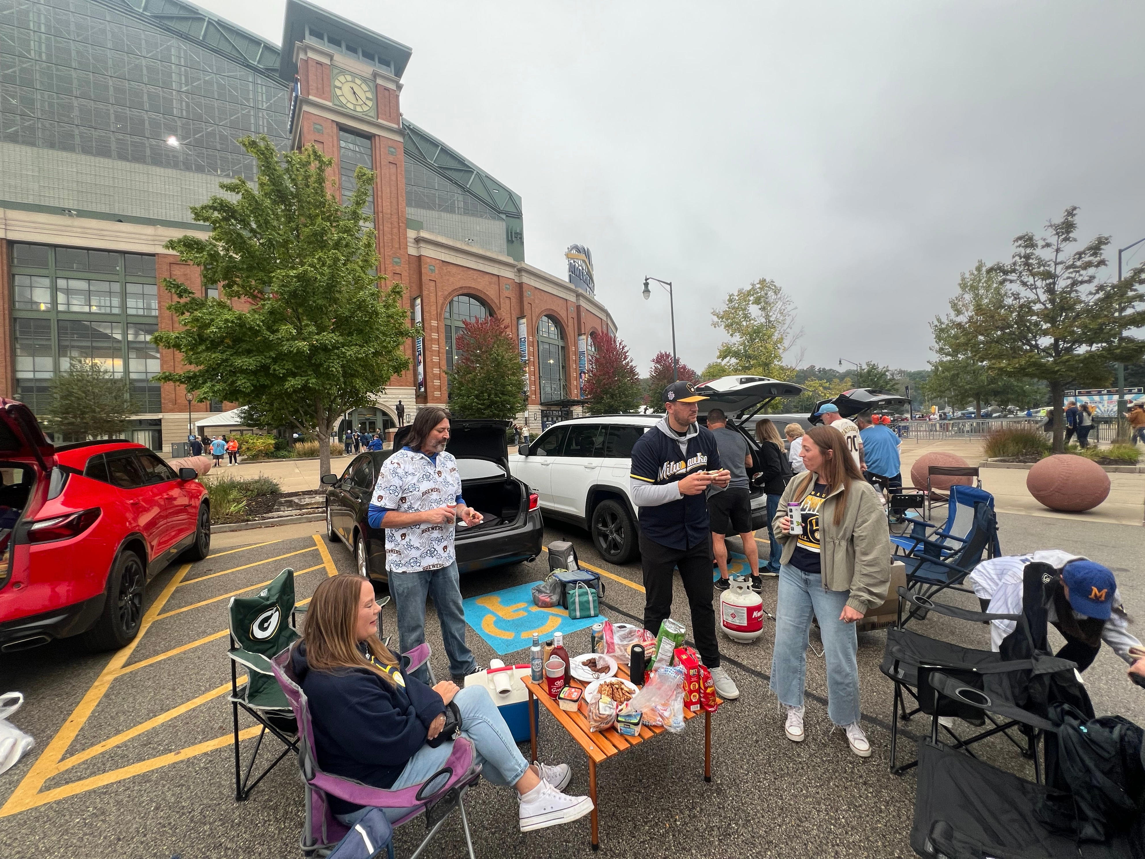 Hardcore Brewers fans traveled from across the state, tailgated before ...