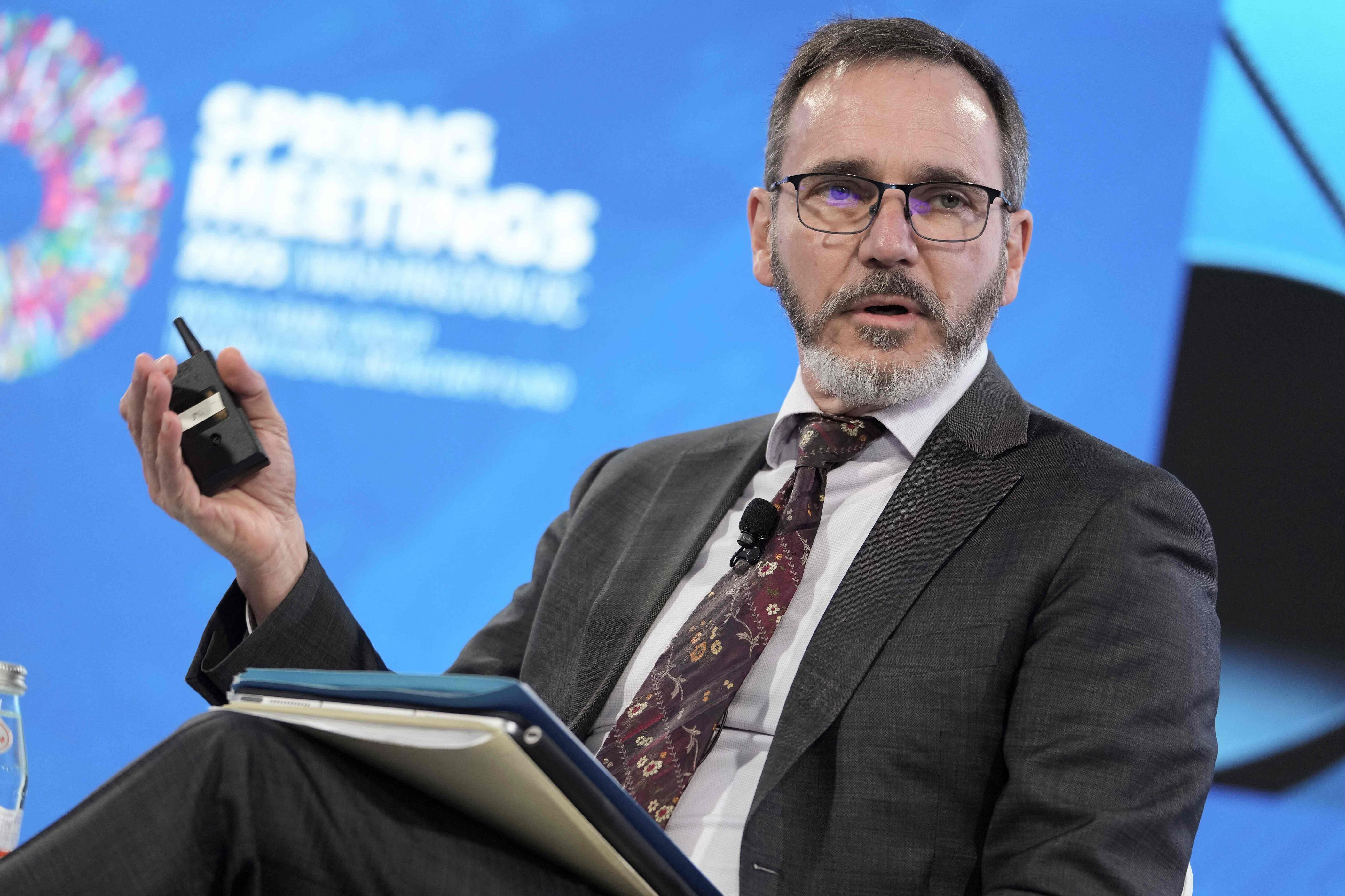 IMF slightly raises 2025 global growth forecast but flags risks