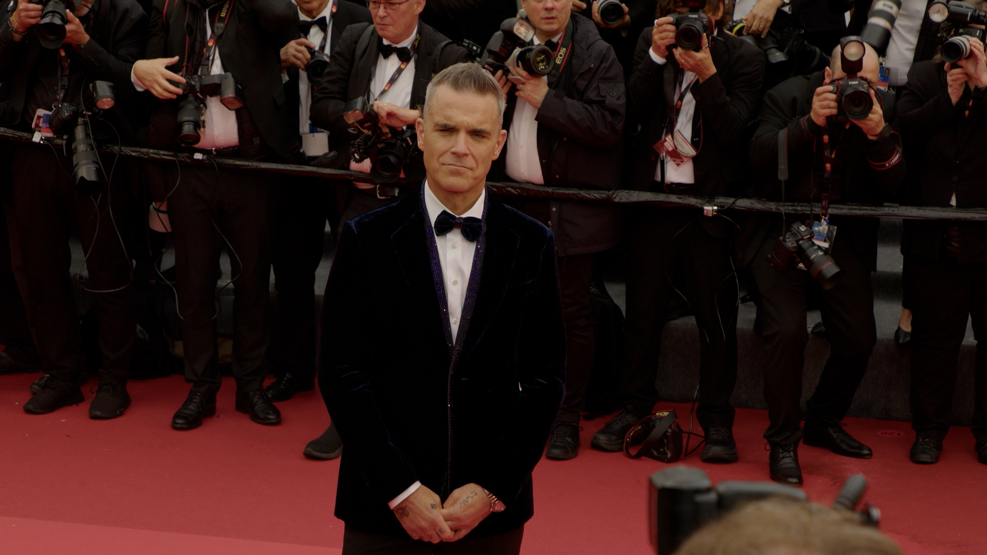 Robbie Williams admits he delayed his album release to dodge Taylor Swift